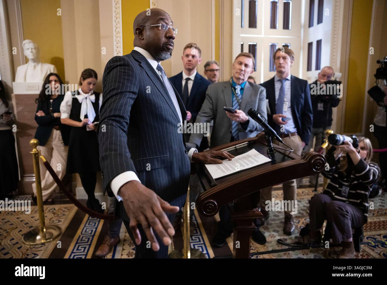 Sen. Raphael Warnock (D-Ga.) speaks during a press conference at the U ...