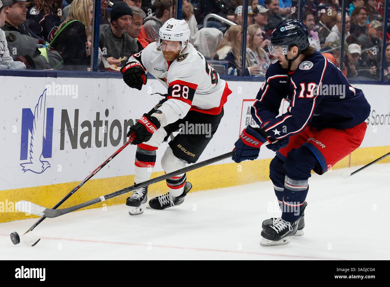 Ottawa Senators' Claude Giroux, left, and Columbus Blue Jackets' Adam ...