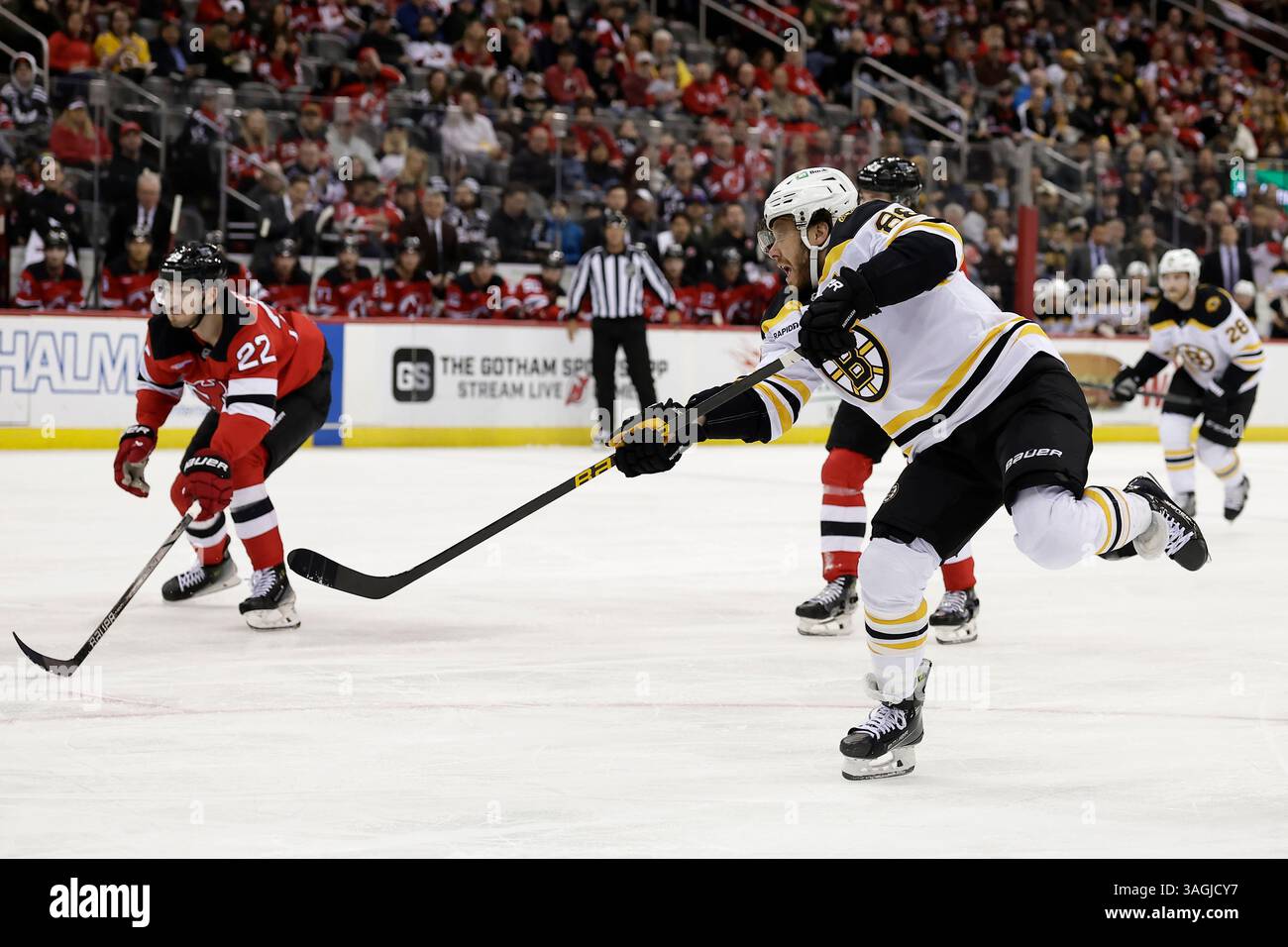 Boston Bruins right wing David Pastrnak (88) shoots and scores a goal ...