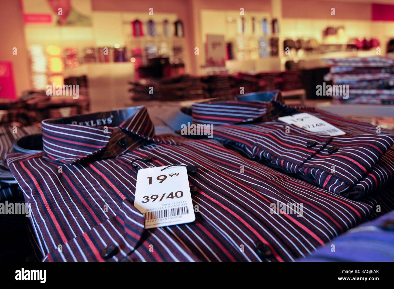 shirts in a clothing store, textile design and fashion trends shirts in ...