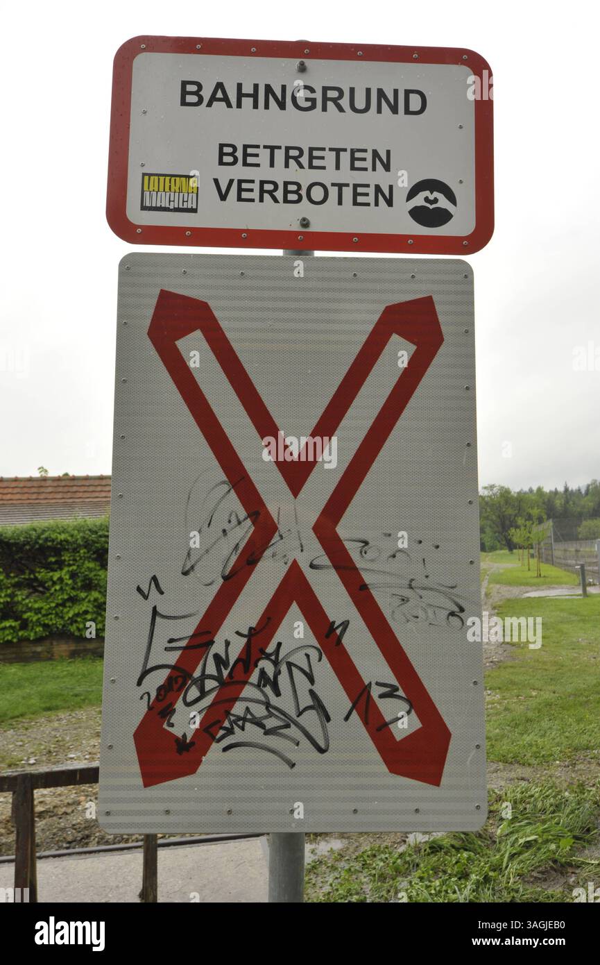 ungated railroad crossing with level crossing sign or St. Andrew s ...