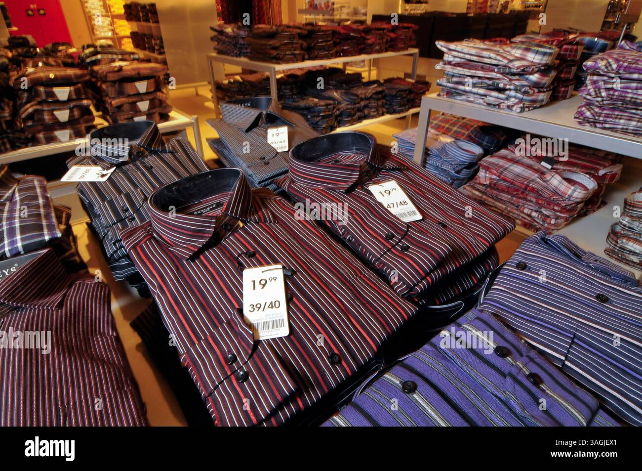 shirts in a clothing store, textile design and fashion trends shirts in ...