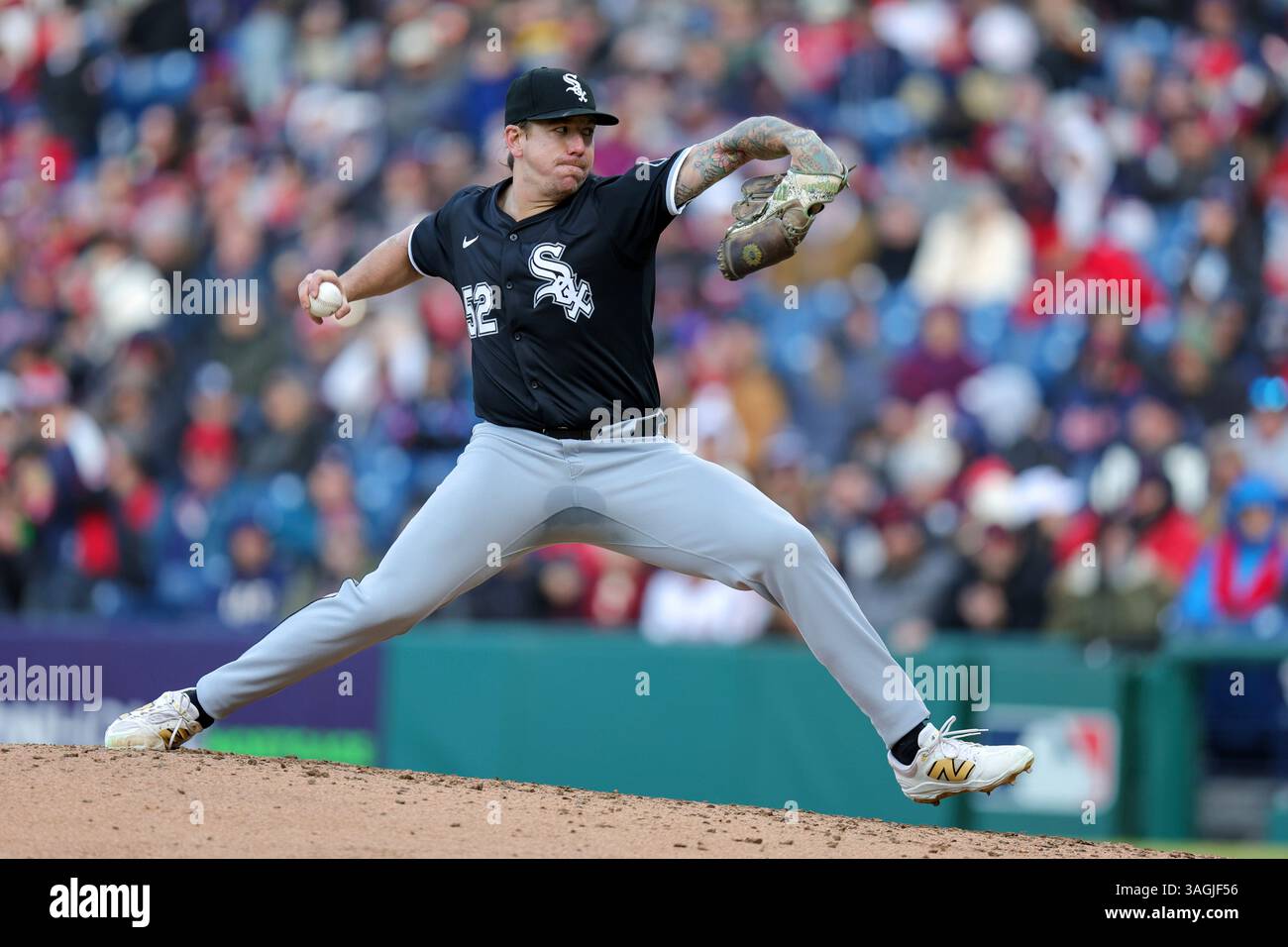 CLEVELAND, OH - APRIL 08: Chicago White Sox relief pitcher Mike Clevinger (52) delivers a pitch ...