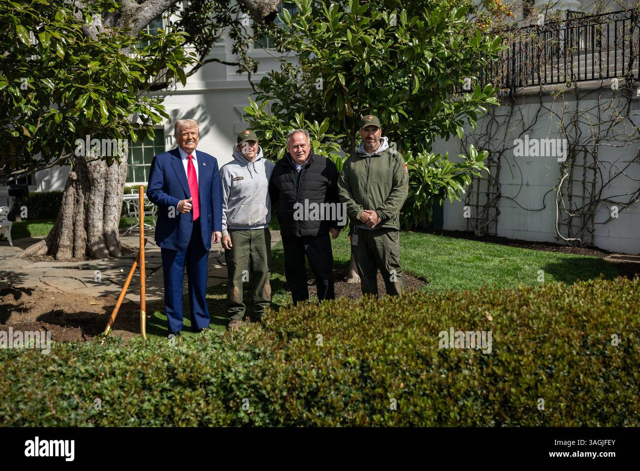 President Donald Trump participates in a commemorative tree-planting ...