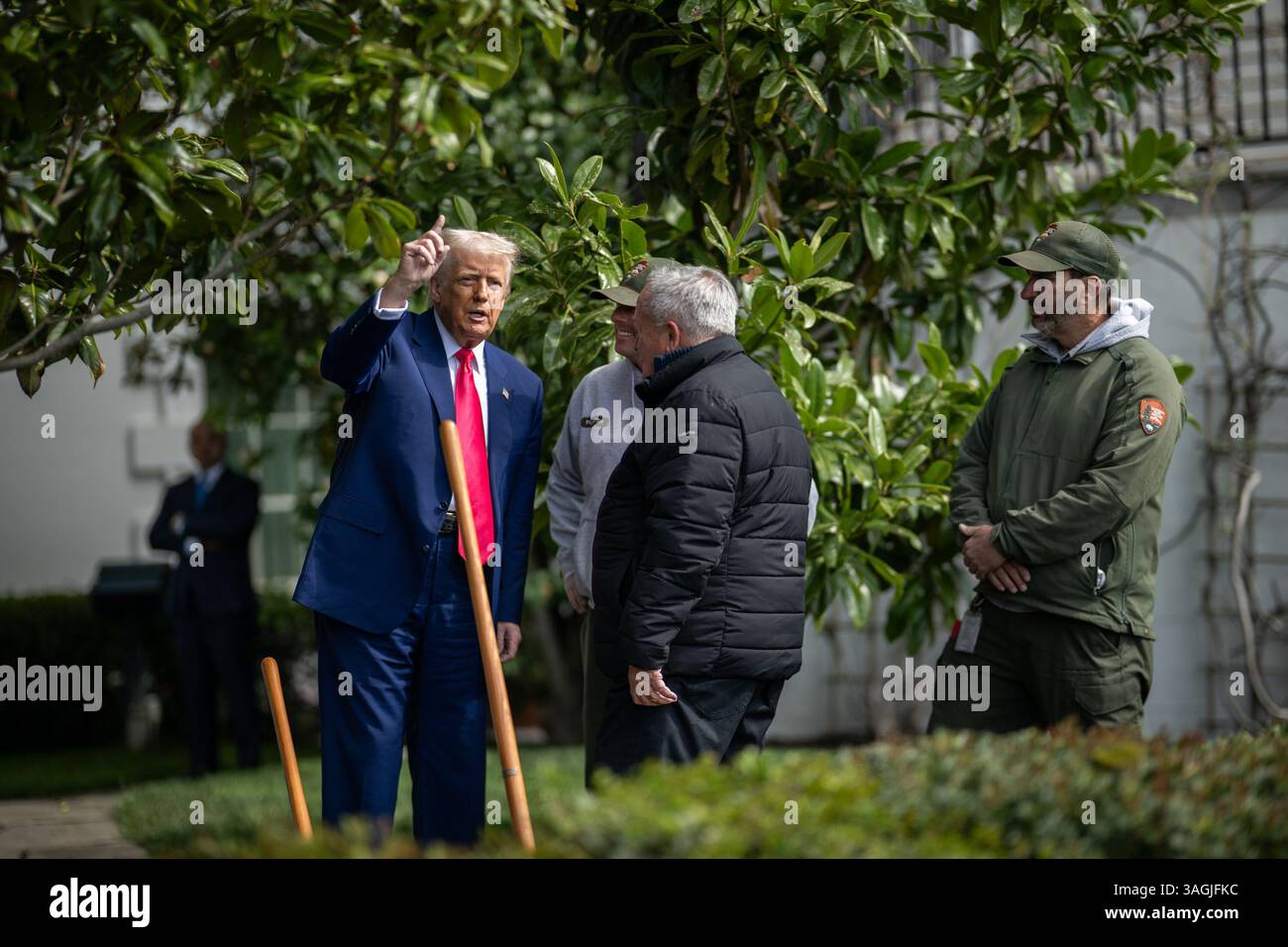 President Donald Trump participates in a commemorative tree-planting ...