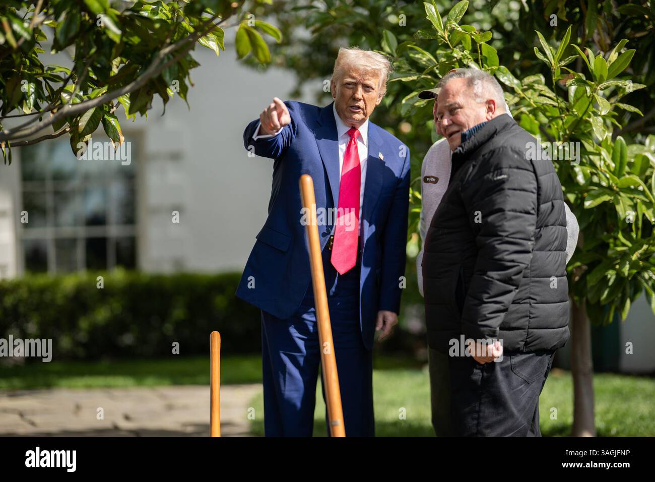 President Donald Trump participates in a commemorative tree-planting ...