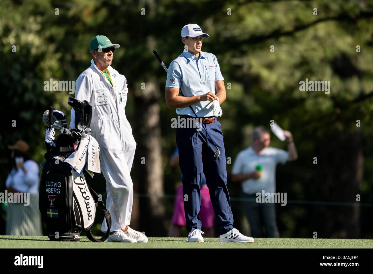 Ludvig Åberg of, Sweden. , . and caddie Joe Skovron during a practice ...