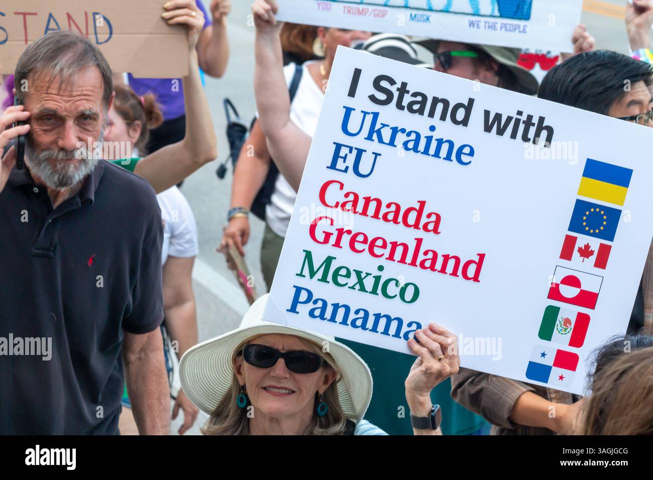 Atlanta, GA / USA - April 5, 2025: Woman holds sign supporting ...