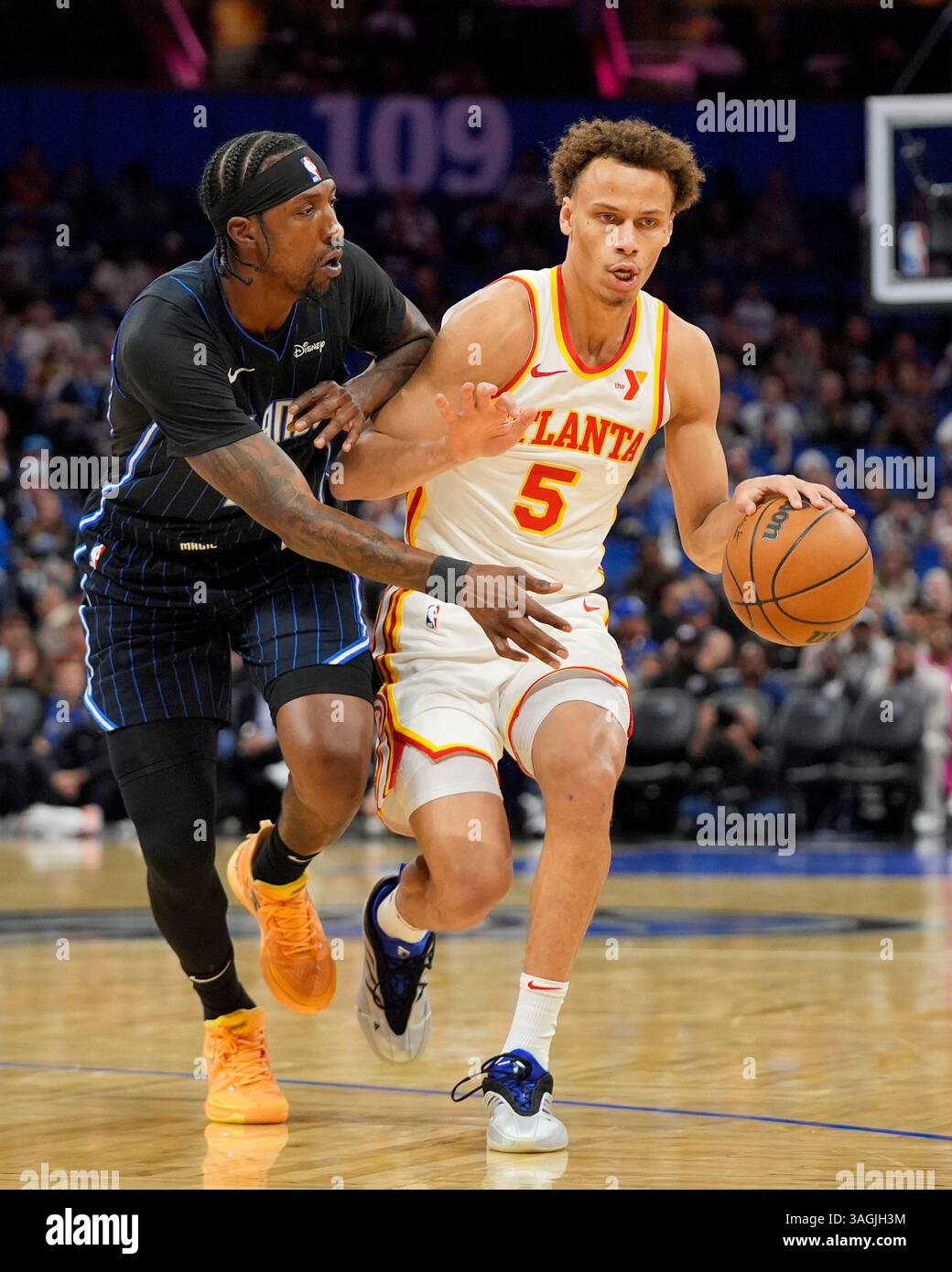 Atlanta Hawks guard Dyson Daniels (5) moves the ball past Orlando Magic ...