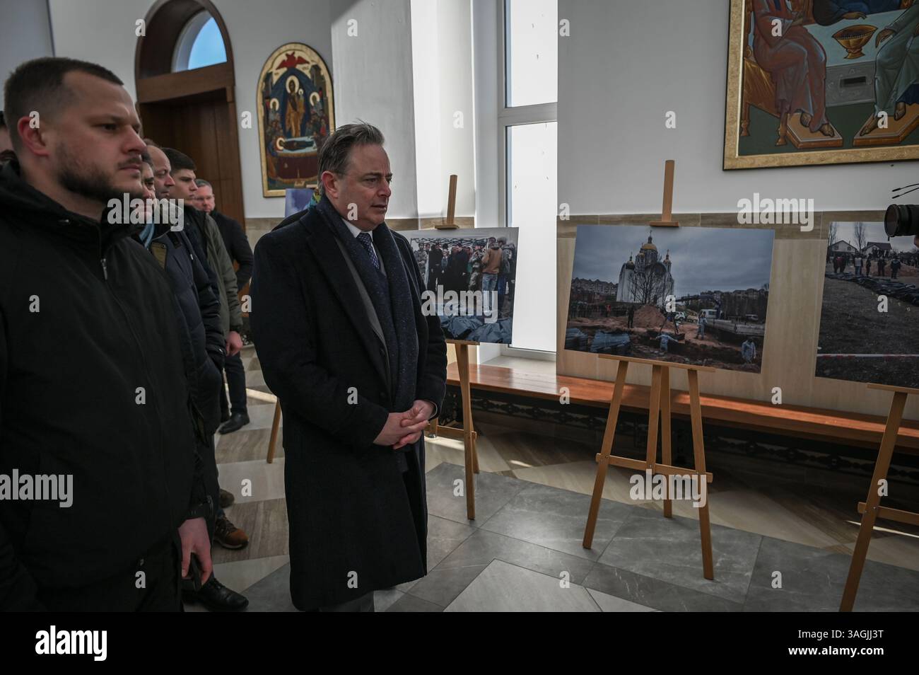 Bucha, Ukraine. 08th Apr, 2025. Prime Minister Bart De Wever looks at ...