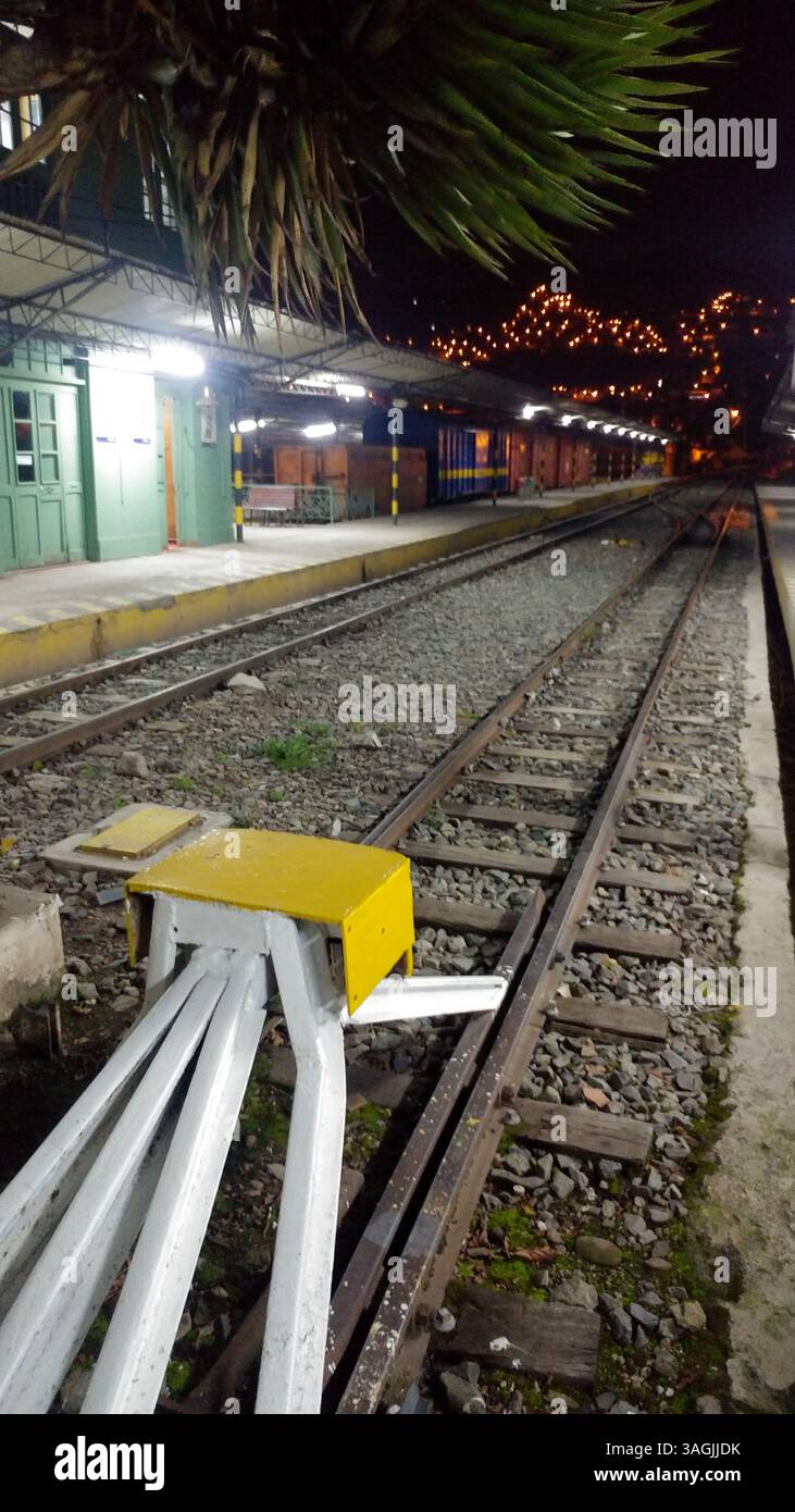 Tracks of the train station alone at night in Cusco Peru Stock Photo ...