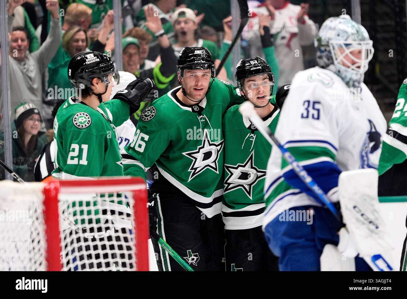 Dallas Stars' Jason Robertson (21), Mikko Rantanen (96), and Wyatt ...