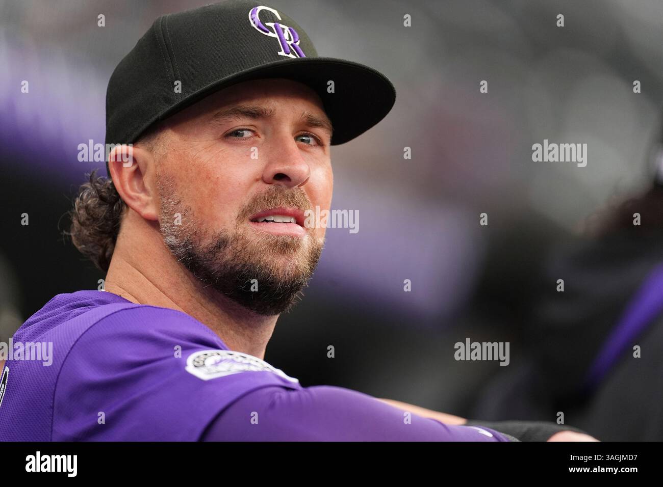 Colorado Rockies second baseman Kyle Farmer waits to take the field in ...
