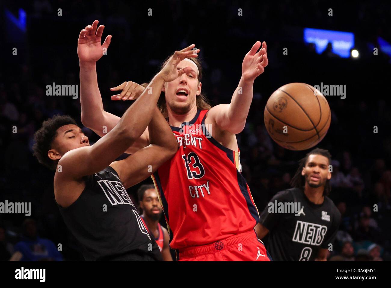 Brooklyn Nets guard Reece Beekman (4) and New Orleans Pelicans forward Kelly Olynyk (13) battle ...