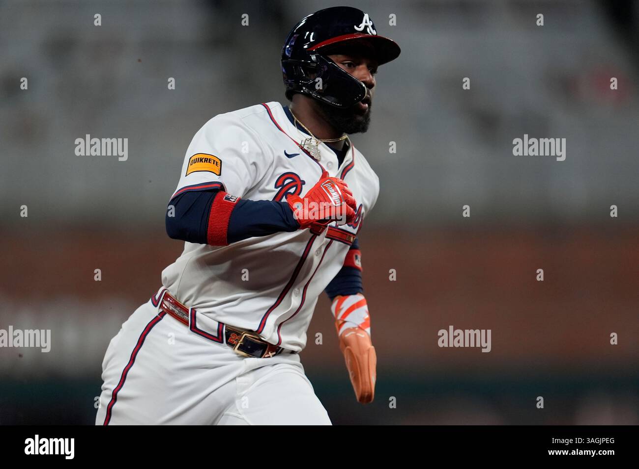 Atlanta Braves' Michael Harris II (23) advances to third base on a hit ...