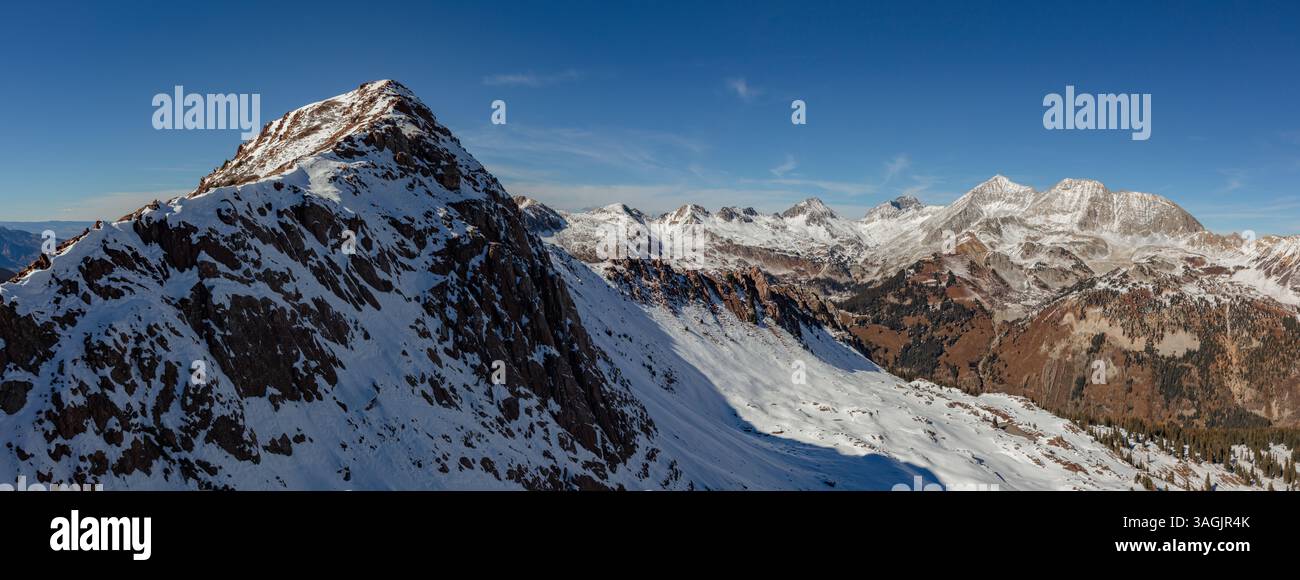 A ridge above Lead King Basin remains in shadow while Siberia Peak ...