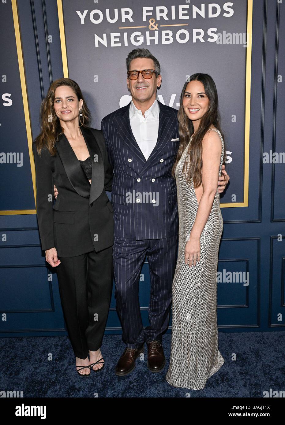 Amanda Peet, left, Jon Hamm and Olivia Munn attend the Apple TV+ ...