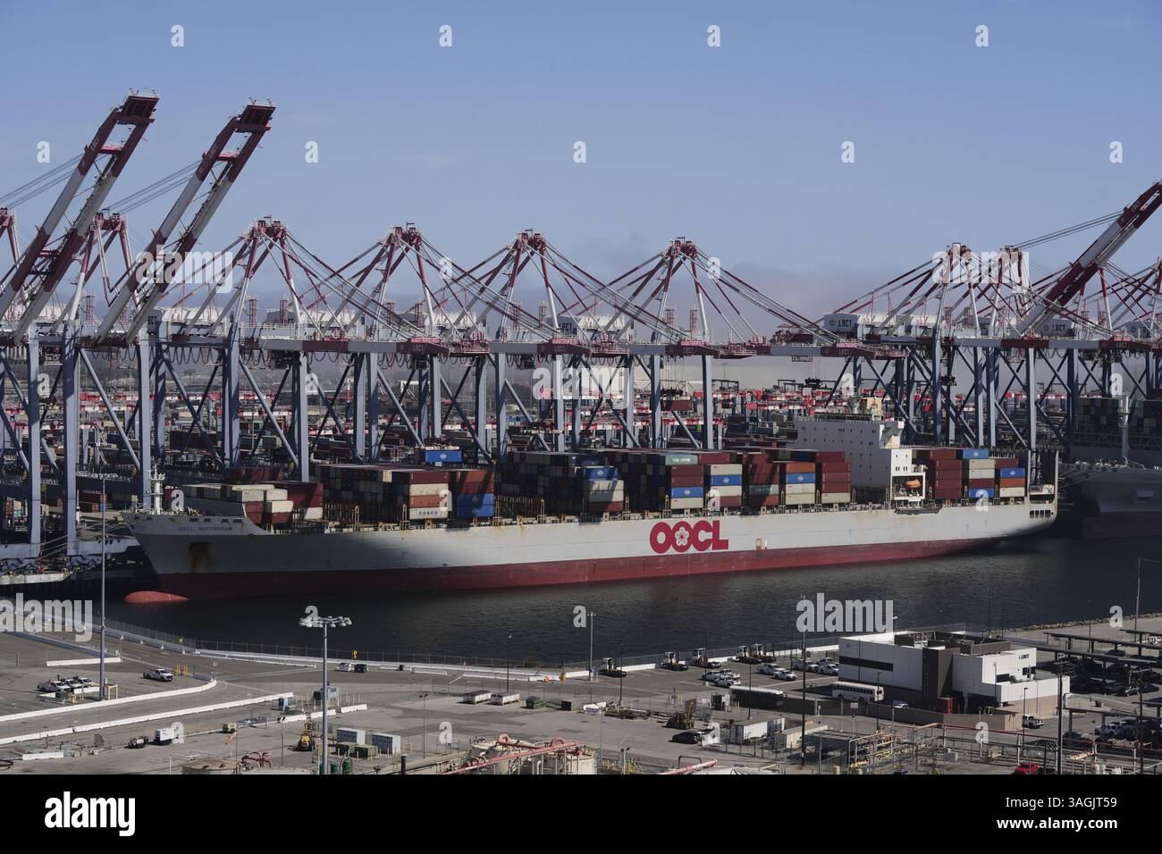 The OOCL Rotterdam container ship is moored at the Long Beach Container ...