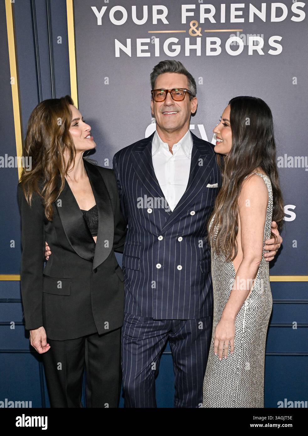 Amanda Peet, left, Jon Hamm and Olivia Munn attend the Apple TV+ ...