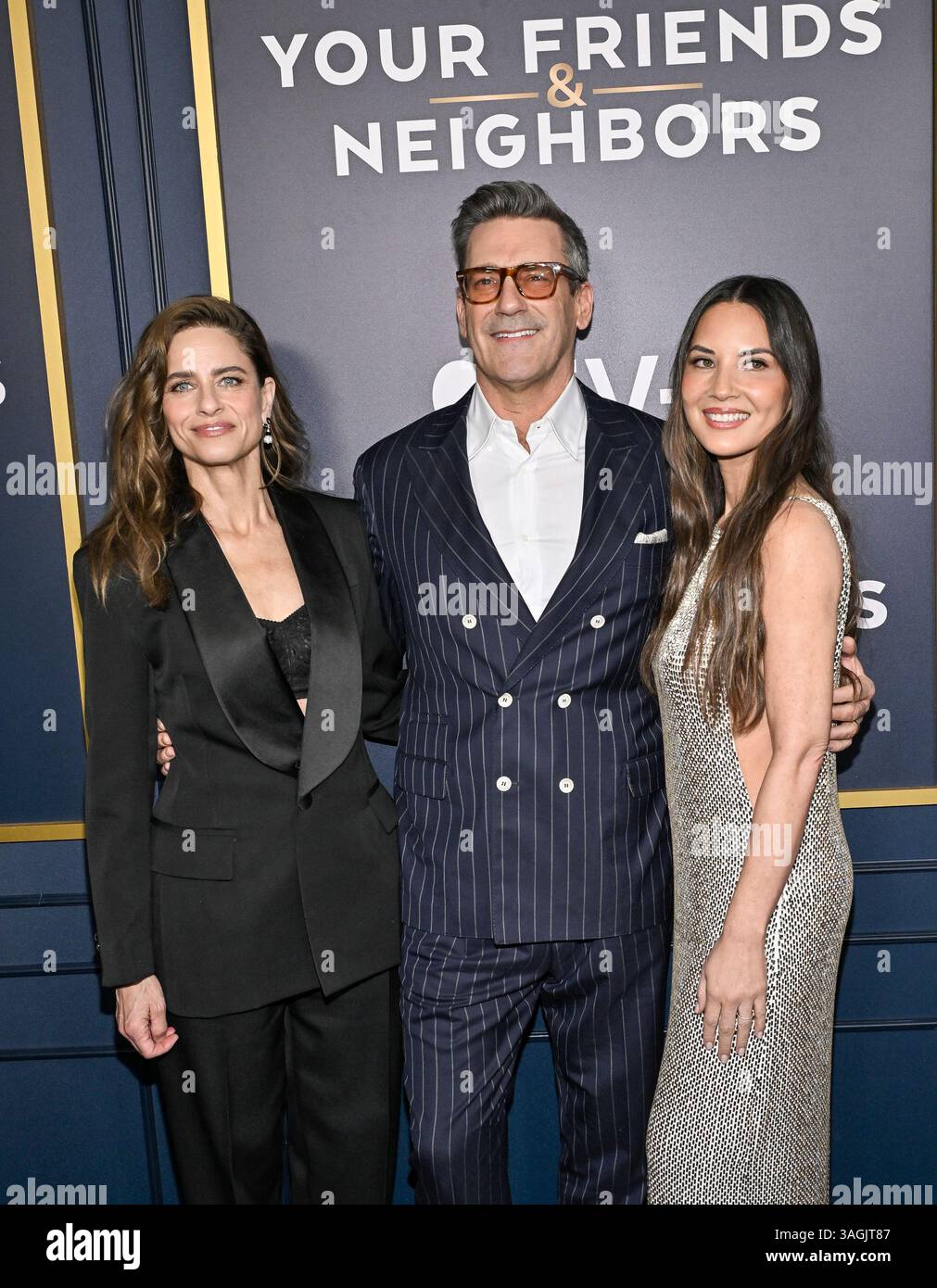 Amanda Peet, left, Jon Hamm and Olivia Munn attend the Apple TV+ ...