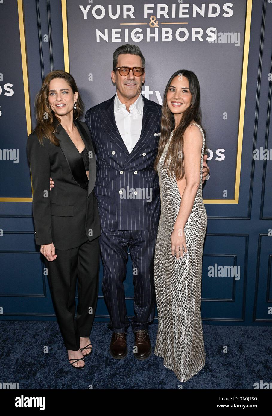 Amanda Peet, left, Jon Hamm and Olivia Munn attend the Apple TV+ ...