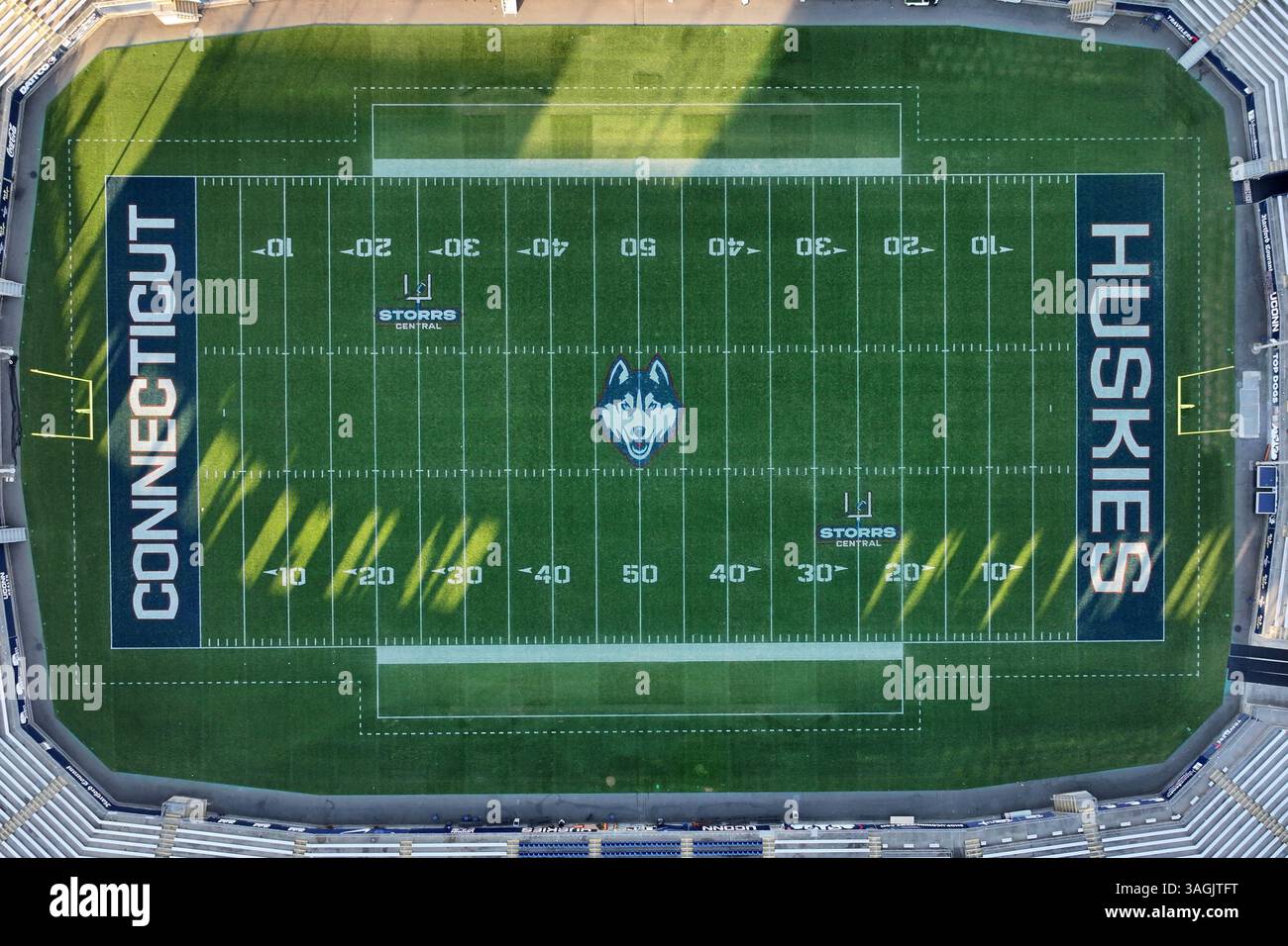 The UConn Huskies logo at midfield of Pratt & Whitney Stadium at ...