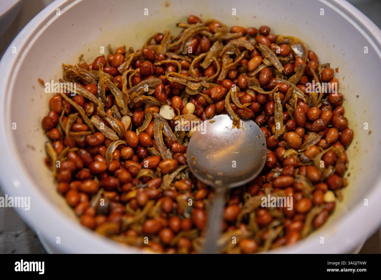 At a Malaysian buffet, anchovies and peanuts Stock Photo - Alamy