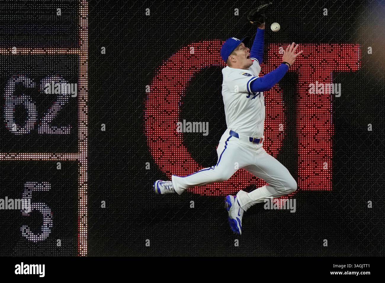 Kansas City Royals left fielder Mark Canha can't catch a double hit by ...