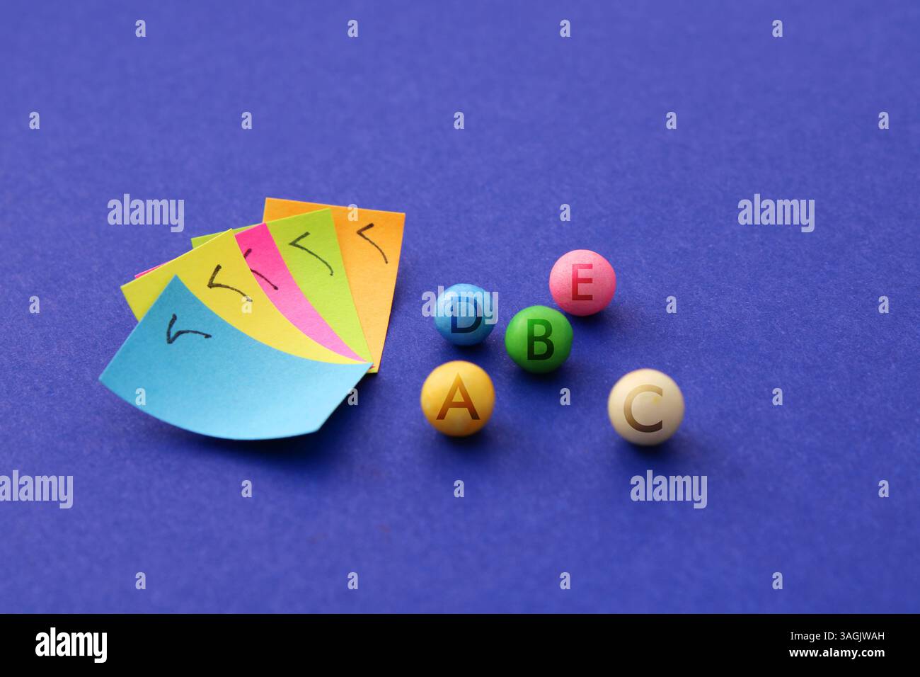 Spheres with letters giving an evaluation along with notes with check ...