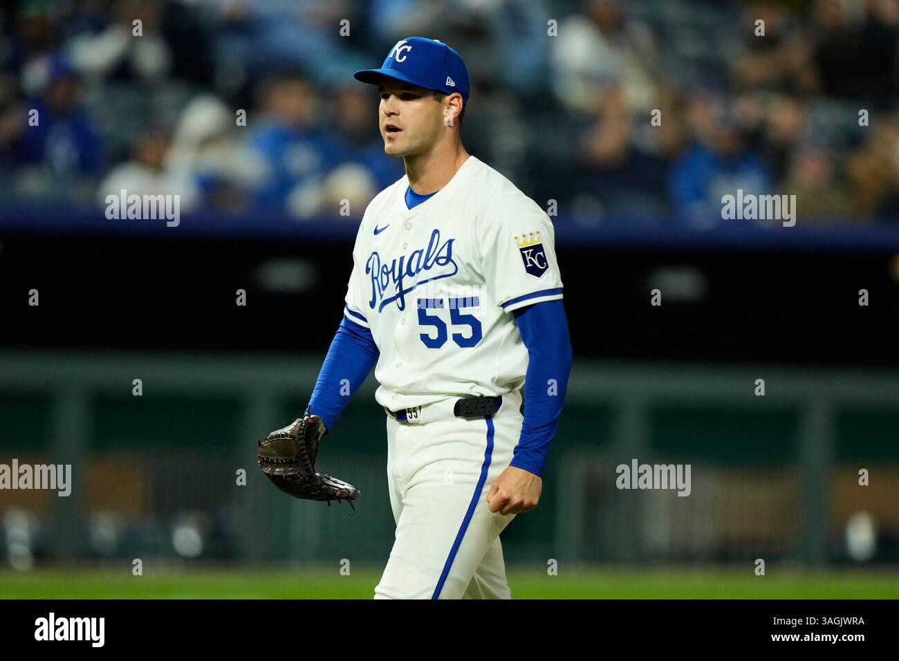Kansas City Royals starting pitcher Cole Ragans walks to the dugout ...