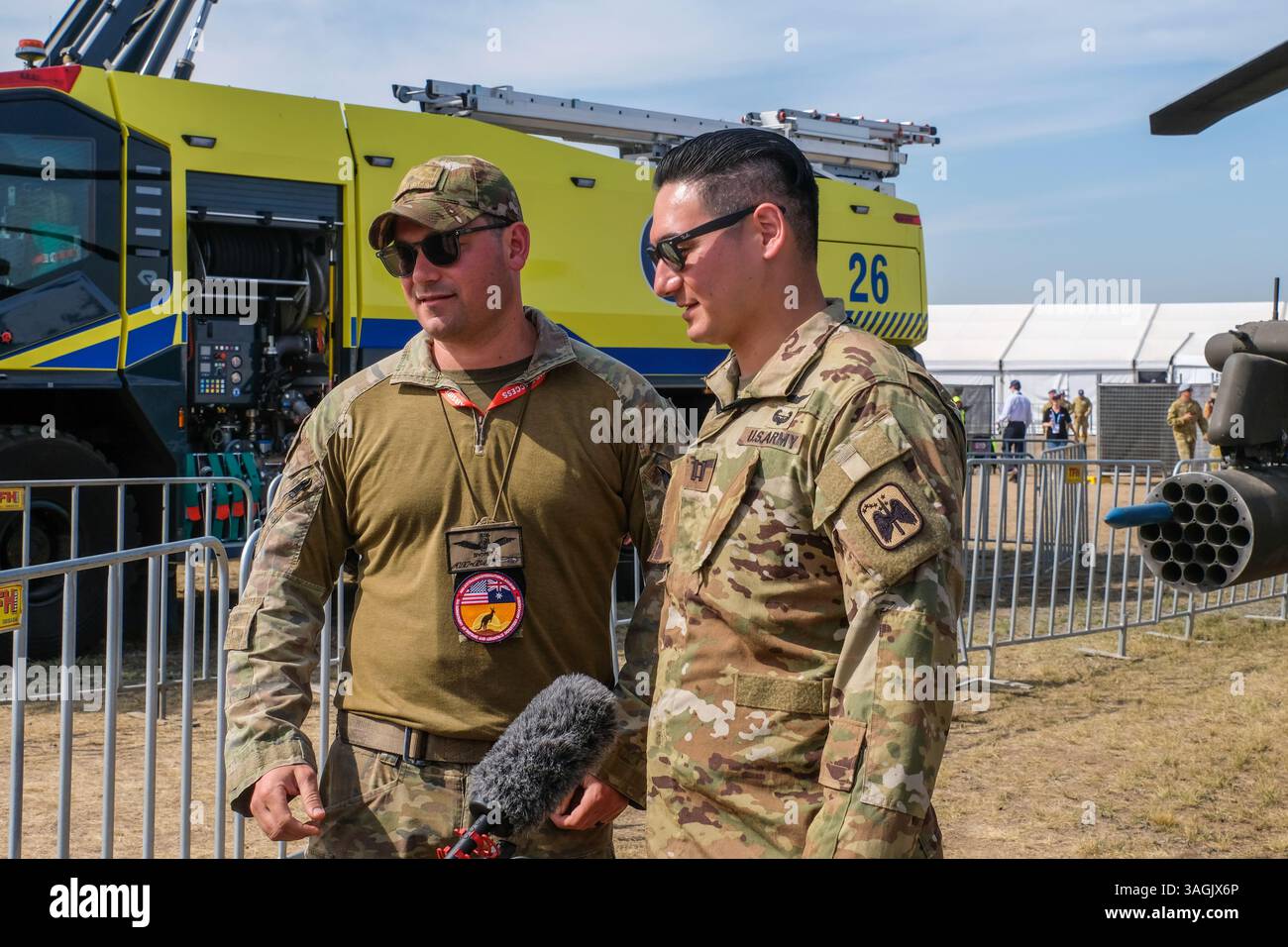 Australian Army Captain Alex Paranthoiene (L) and U.S. Army Capt ...