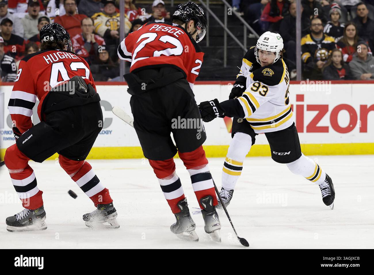 Boston Bruins center Fraser Minten (93) shoots and scores a goal past ...
