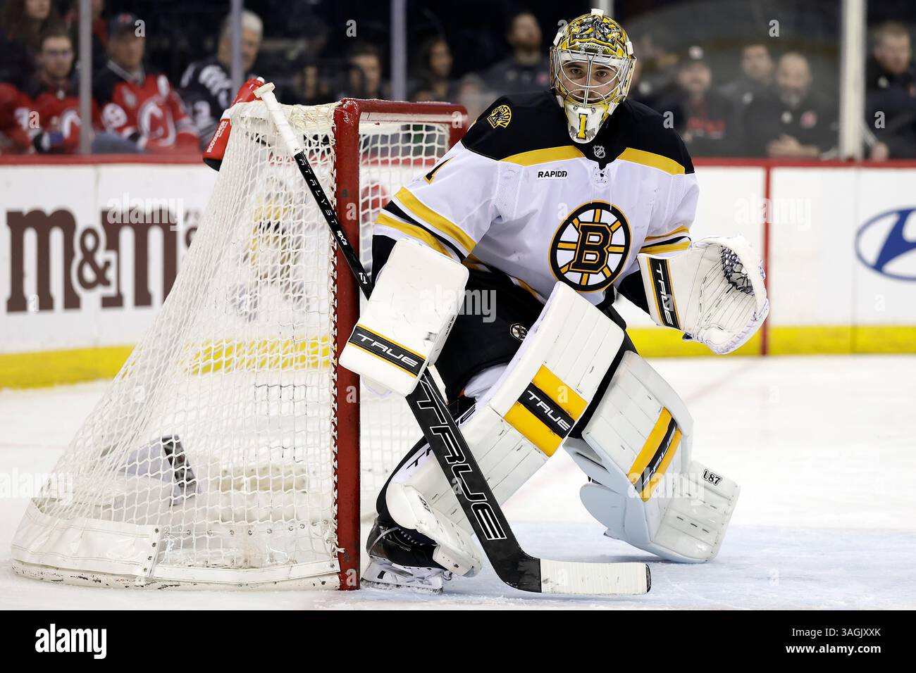 Boston Bruins goaltender Jeremy Swayman (1) defends his net in the ...