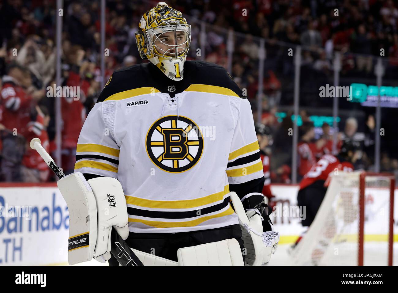 Boston Bruins goaltender Jeremy Swayman (1) reacts after giving up a ...