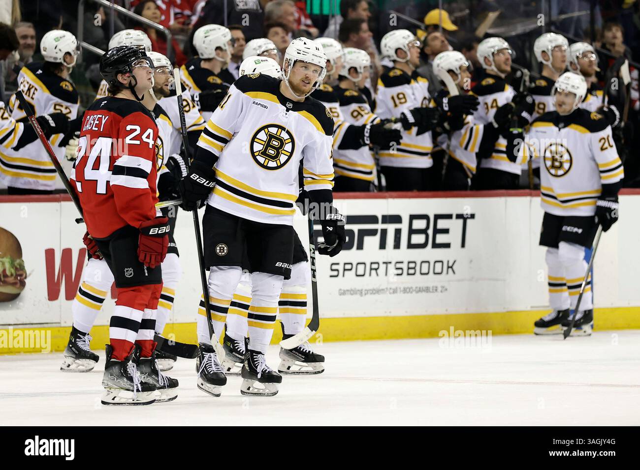 Boston Bruins center Casey Mittelstadt (11) reacts after scoring a goal ...