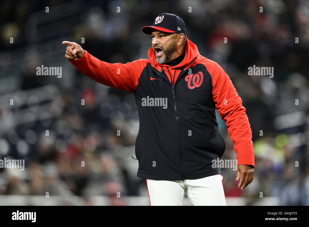 Washington Nationals manager Dave Martinez argues a play at first ...