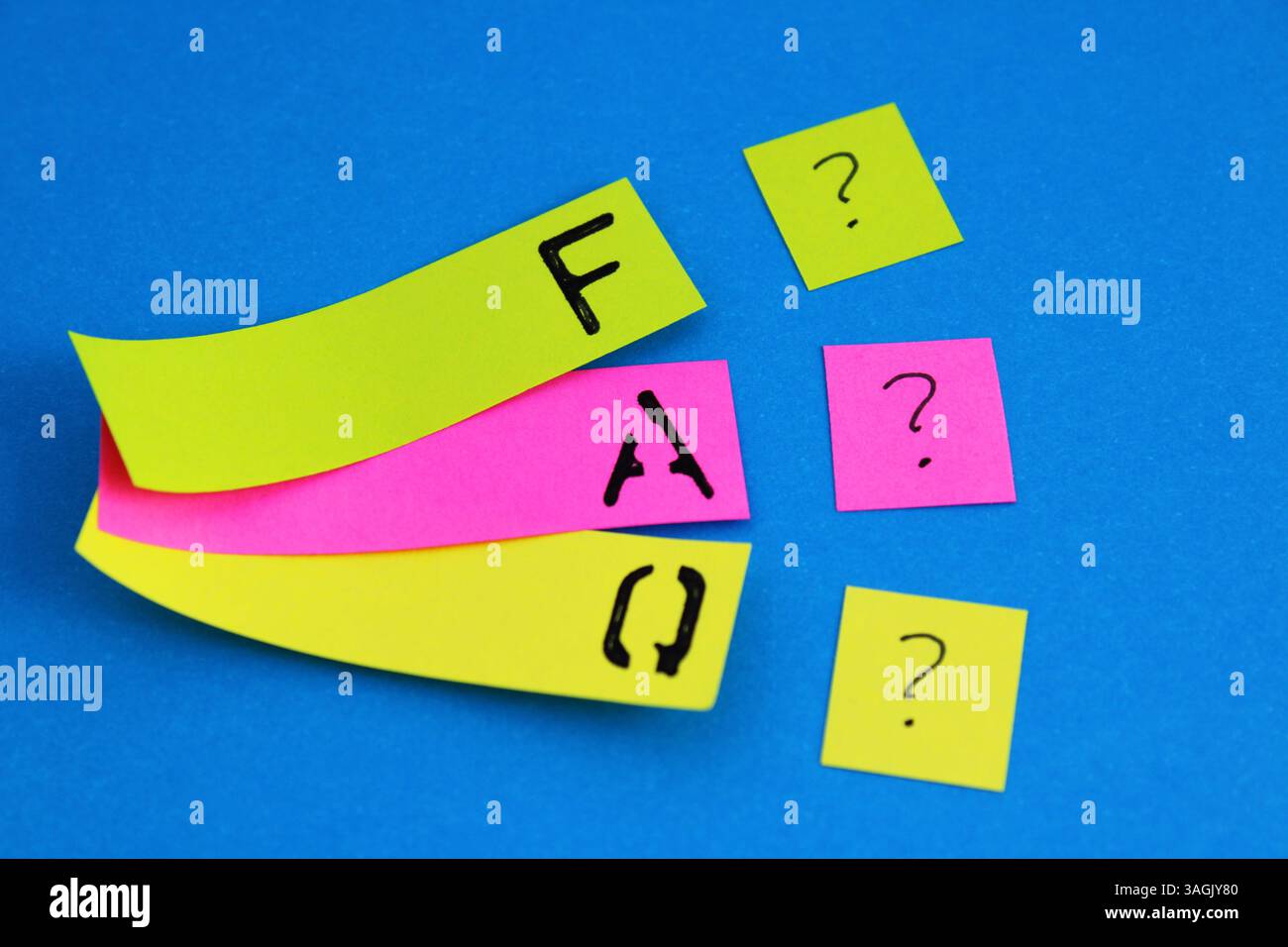 FAQ, sticky notes with frequently asked questions and question marks ...