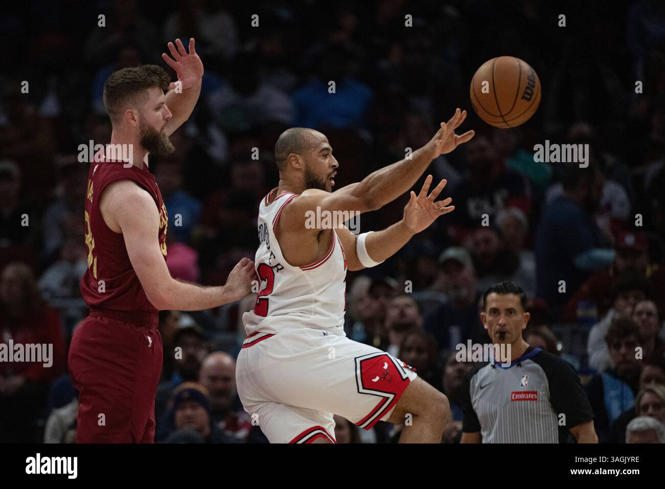 Chicago Bulls' Talen Horton-Tucker, right, passes as Cleveland ...