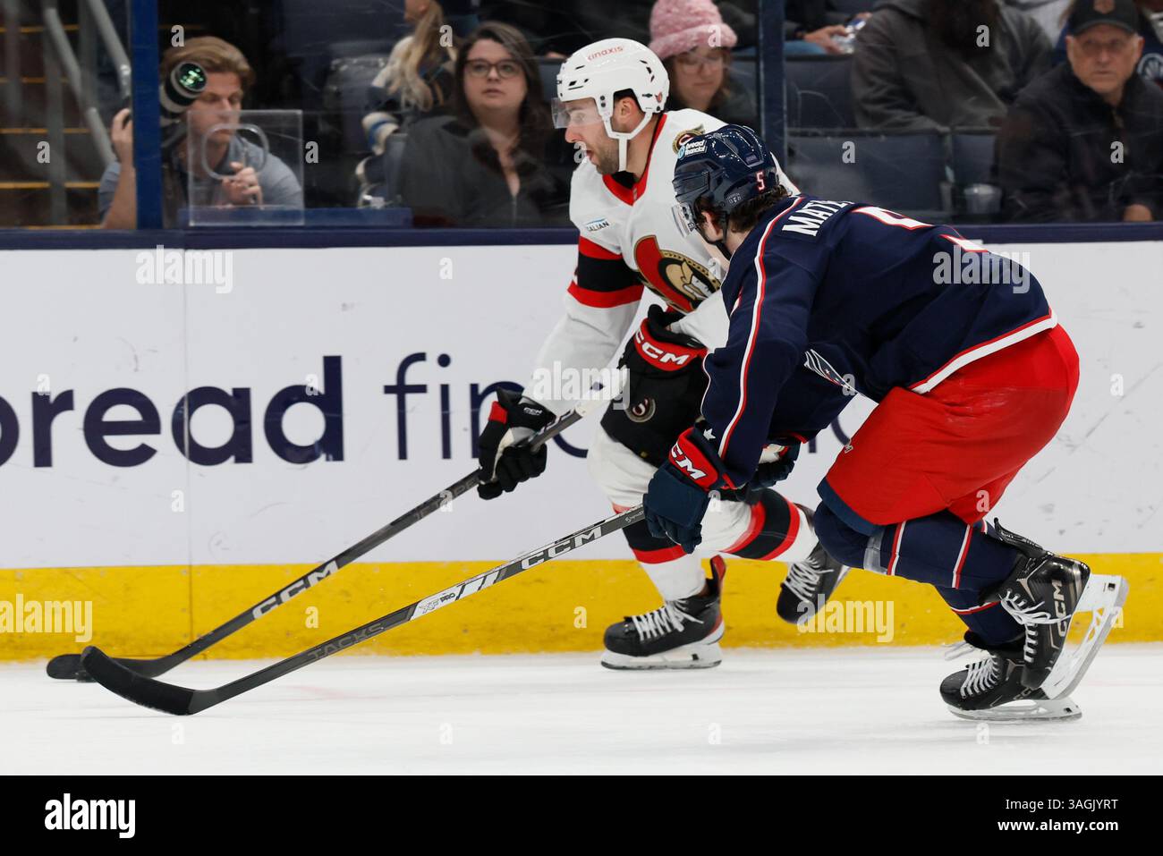 Ottawa Senators' Michael Amadio, left, and Columbus Blue Jackets ...