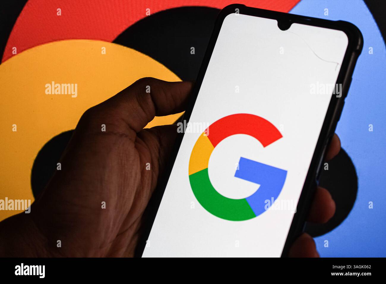 In this photo illustration, the Google logo is seen displayed on a ...