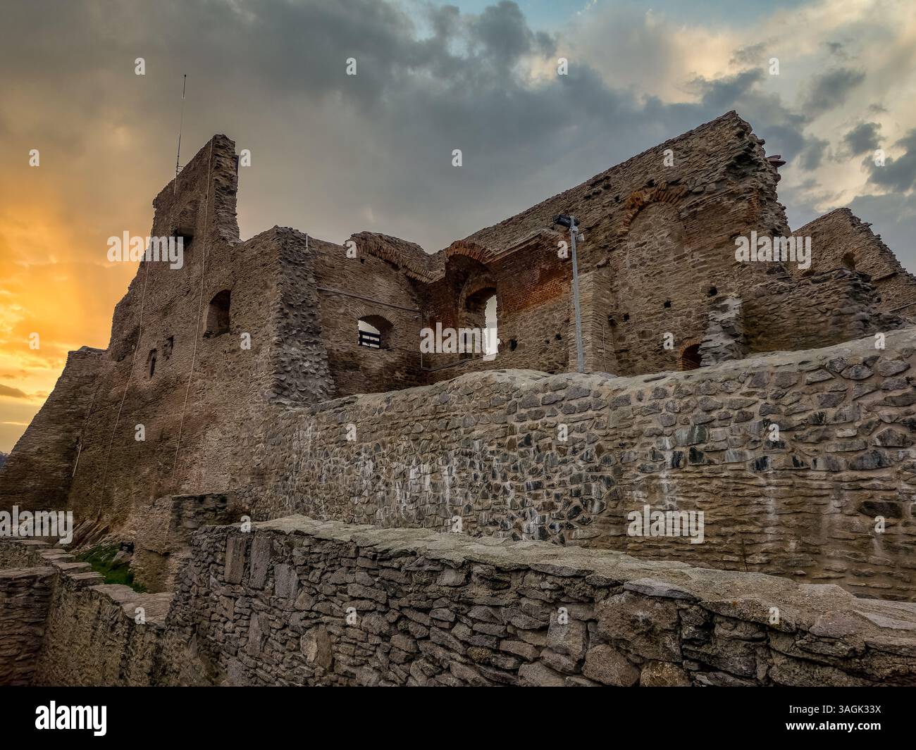 Bastions, walls, ruined palace building in Deva castle Romania with ...