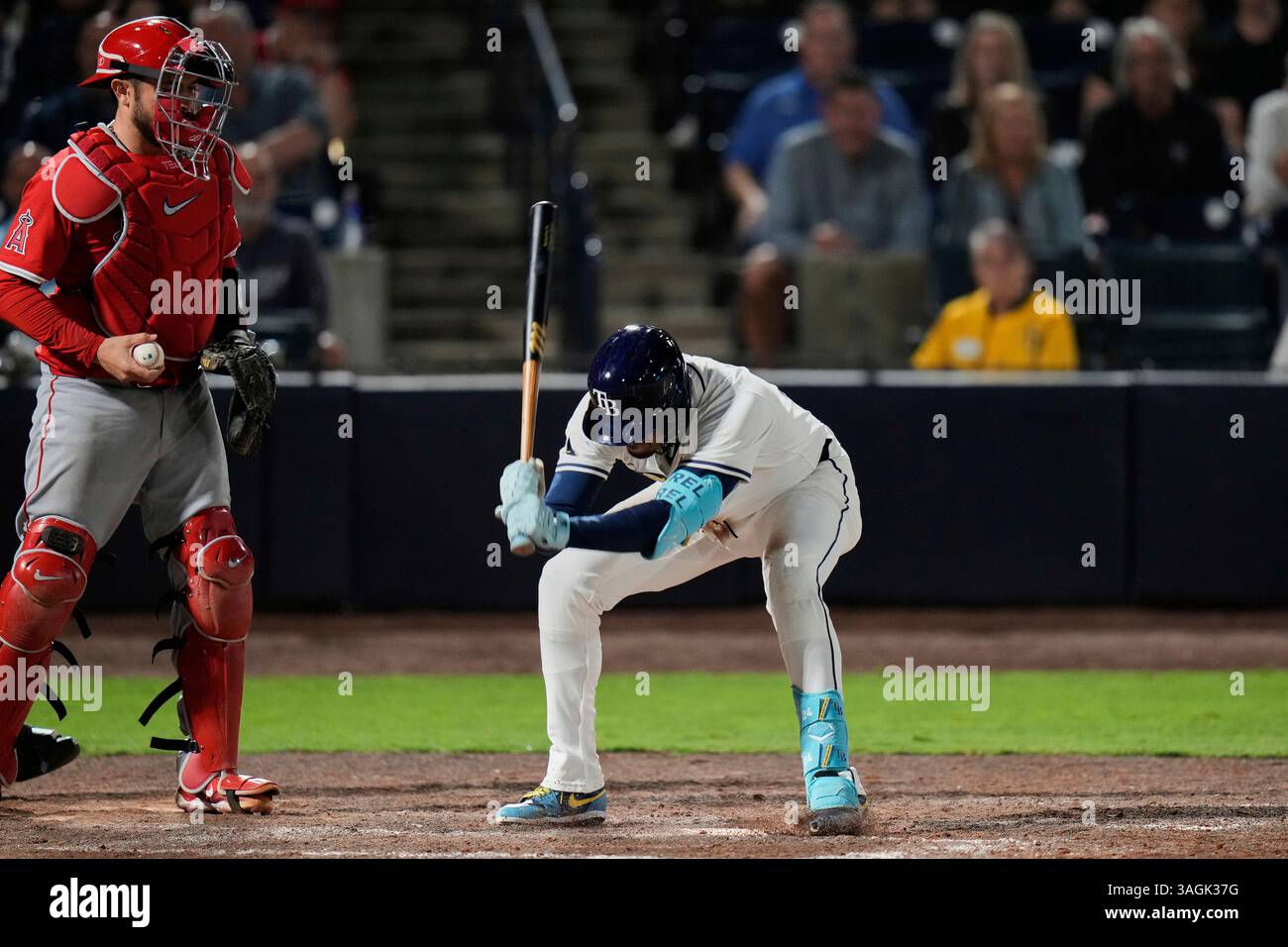 Tampa Bay Rays' Christopher Morel, center, slams his bat after striking ...