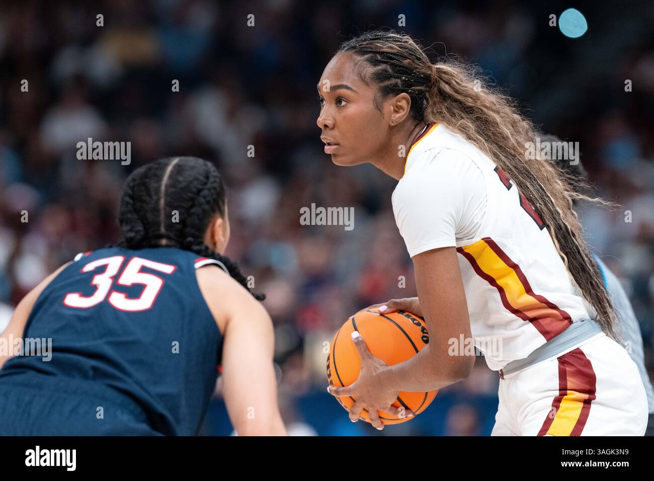 South Carolina guard Bree Hall (23) passes the ball against UConn guard ...