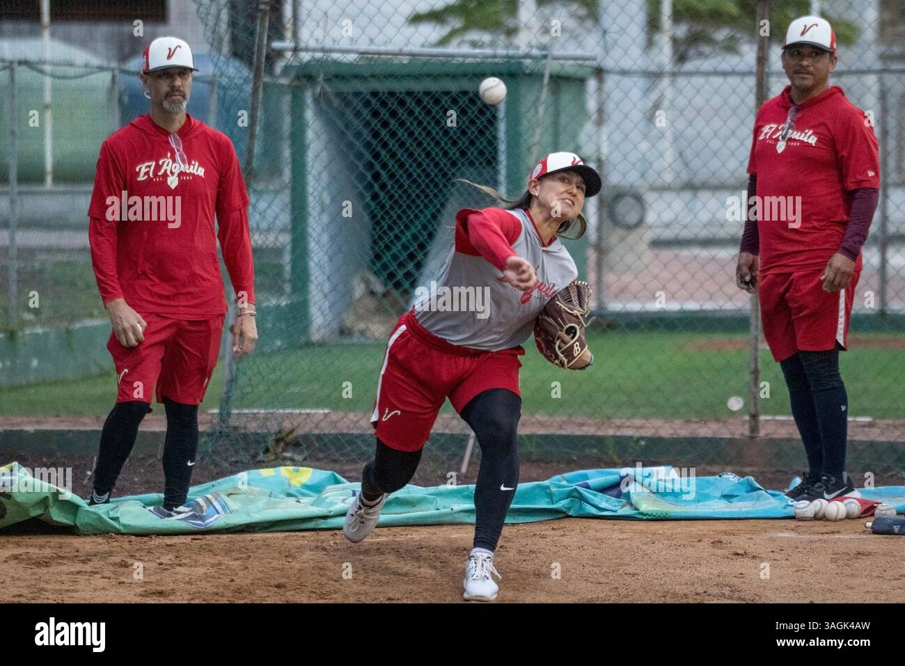 Player Kelsie Whitmore throws a ball during a training session with the ...