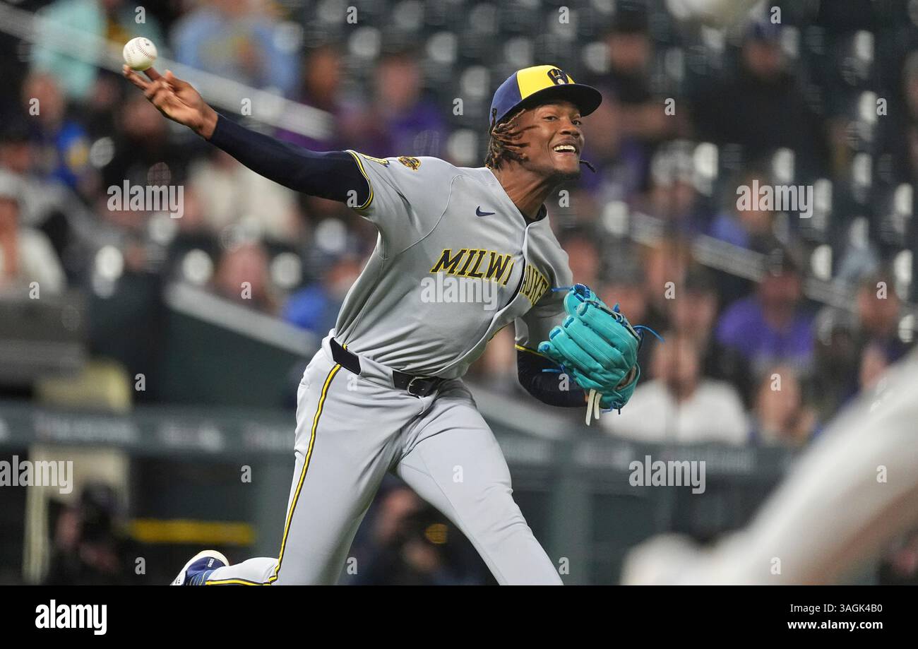 Milwaukee Brewers pitcher Abner Uribe throws to first base after ...