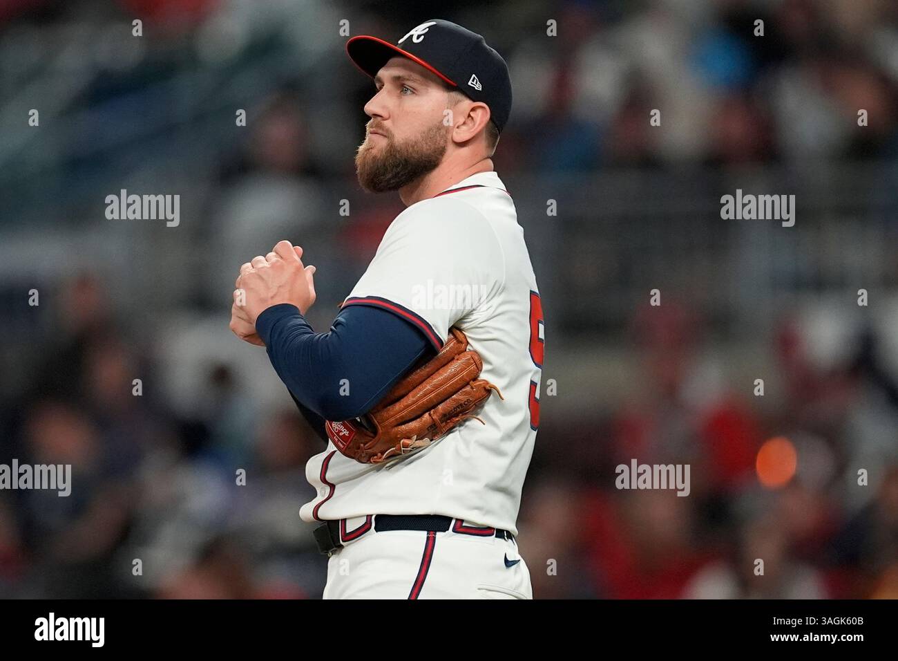 Atlanta Braves pitcher Dylan Lee (52) prepares to leave the game in the ...