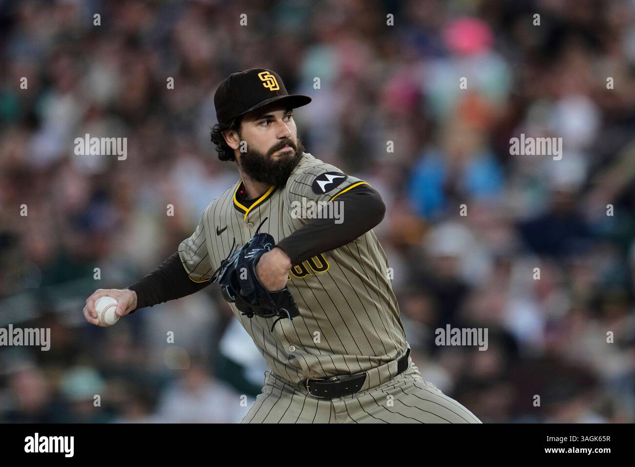 San Diego Padres pitcher Dylan Cease throws to an Athletics batter ...