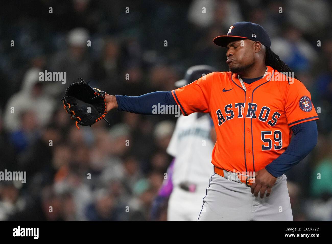 Houston Astros starting pitcher Framber Valdez points after the end of the third inning of a ...