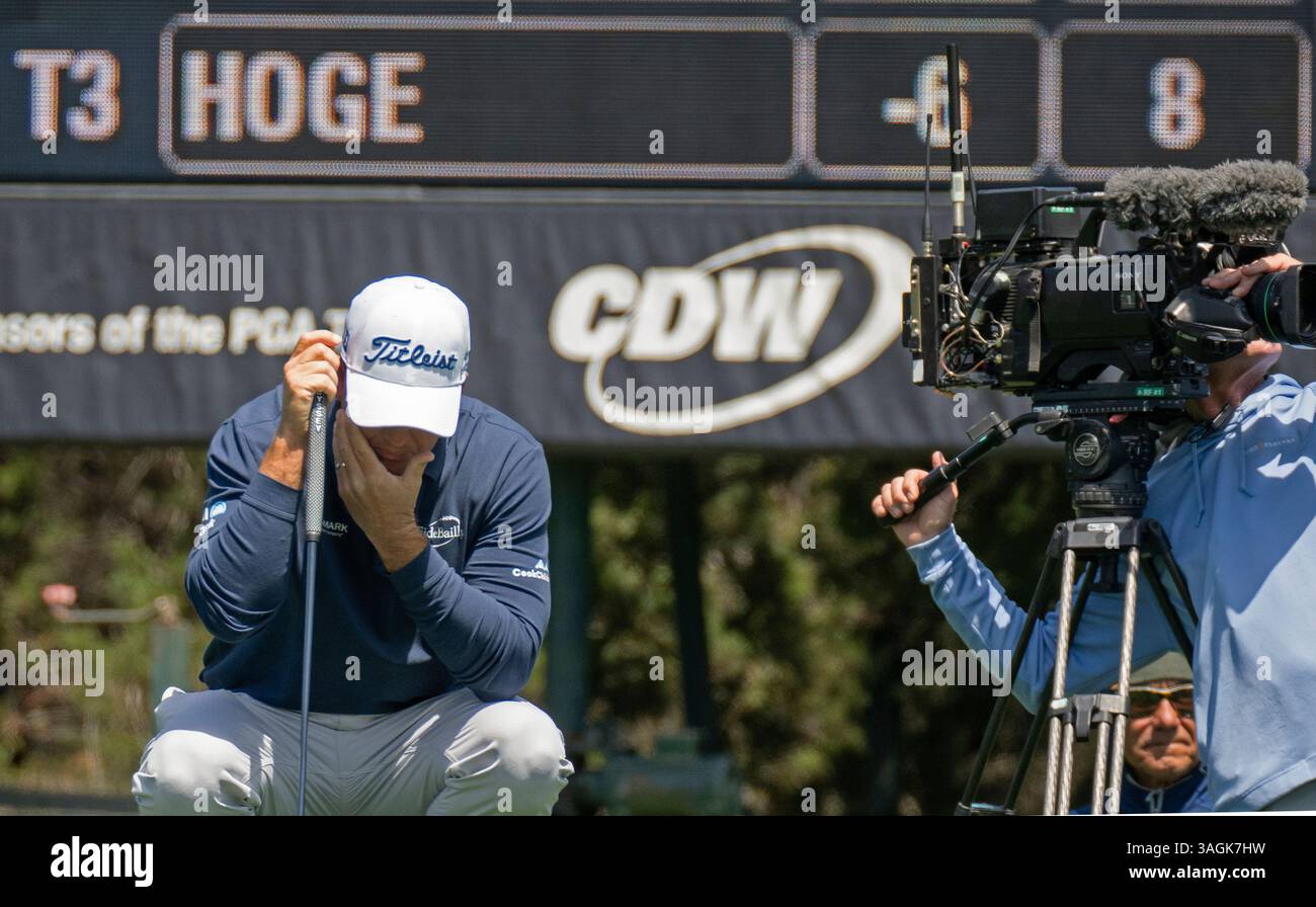 Tom Hoge reacts to a shot on the ninth hole during the final round of ...