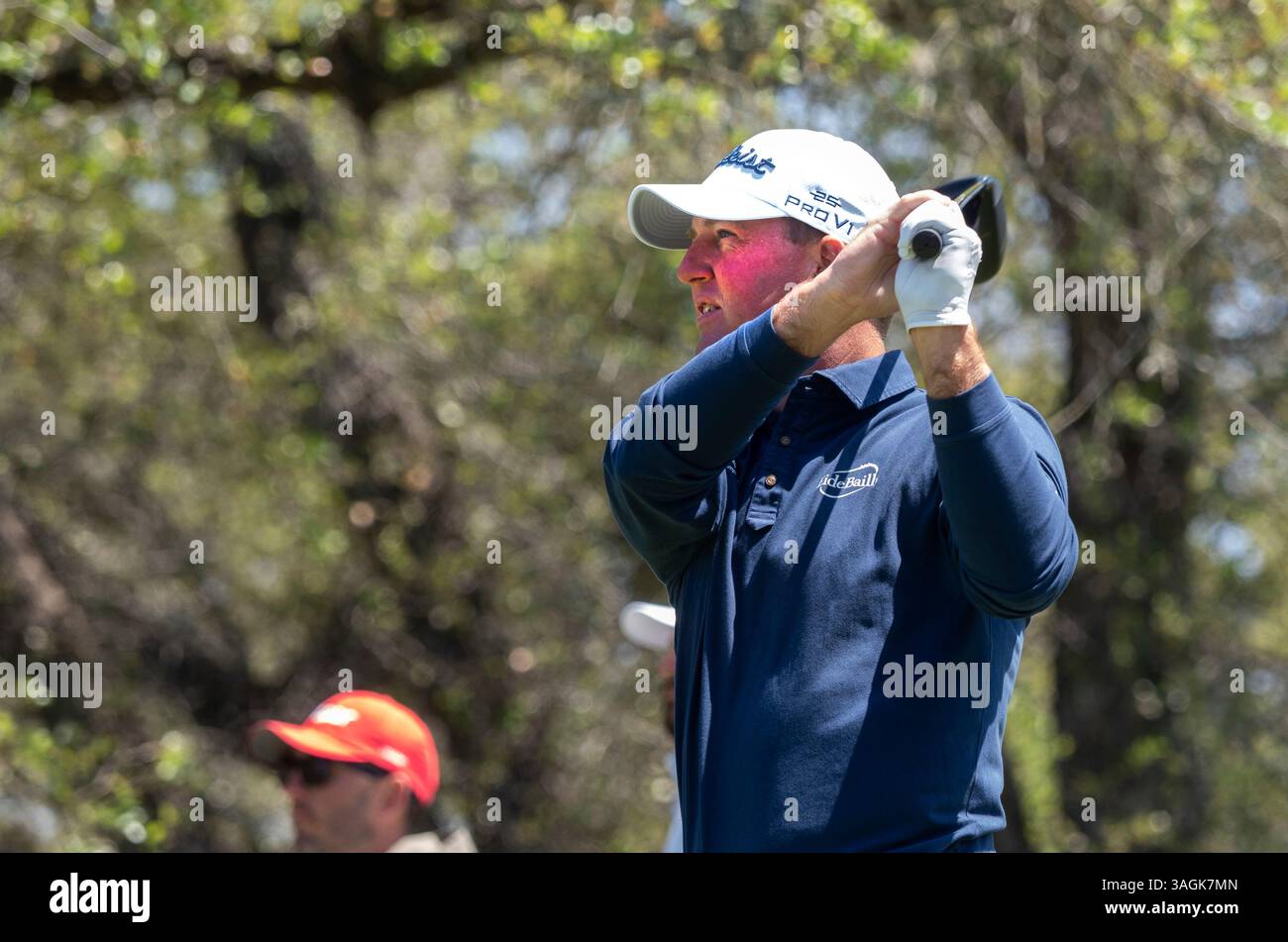 Tom Hoge tees off during the final round of the Valero Texas Open golf ...